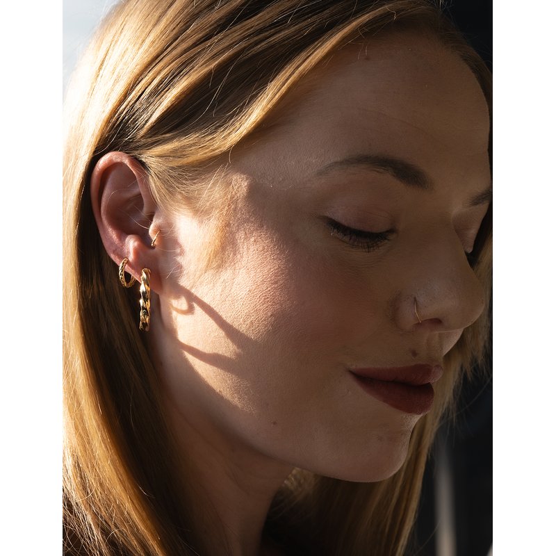 Tight gold hoop earrings store